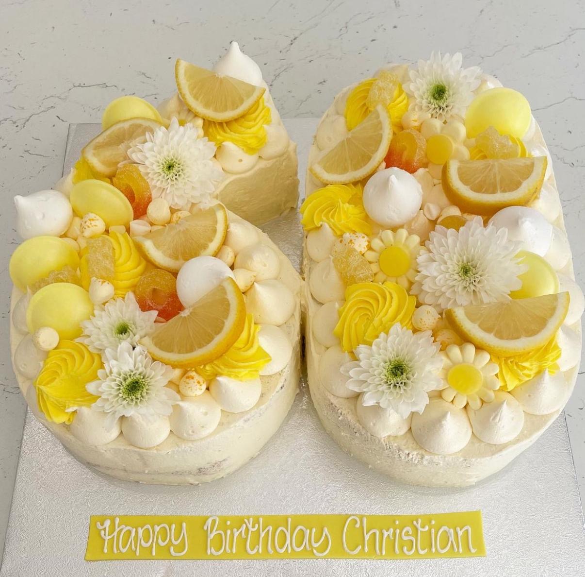 Lemon Meringue Cake with Fresh Flowers, Lemon and sweets - The Cakery ...